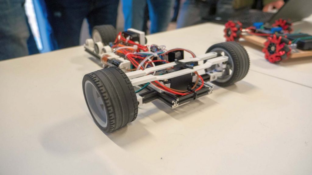 Mechatronics and robotic competition for students on autonomous driving